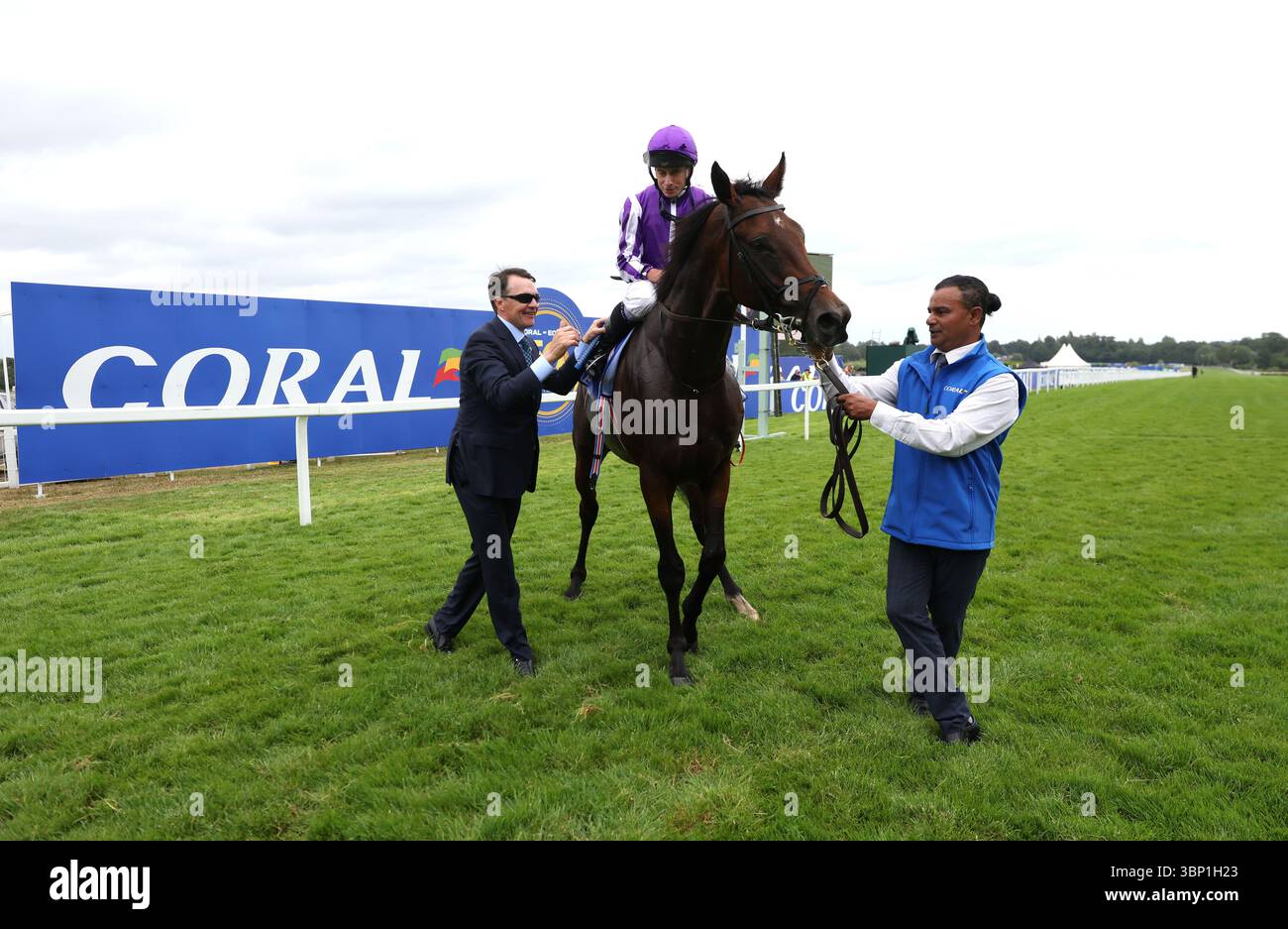 Jockey Ryan Moore and trainer Aidan O'Brien (left) after winning the ...