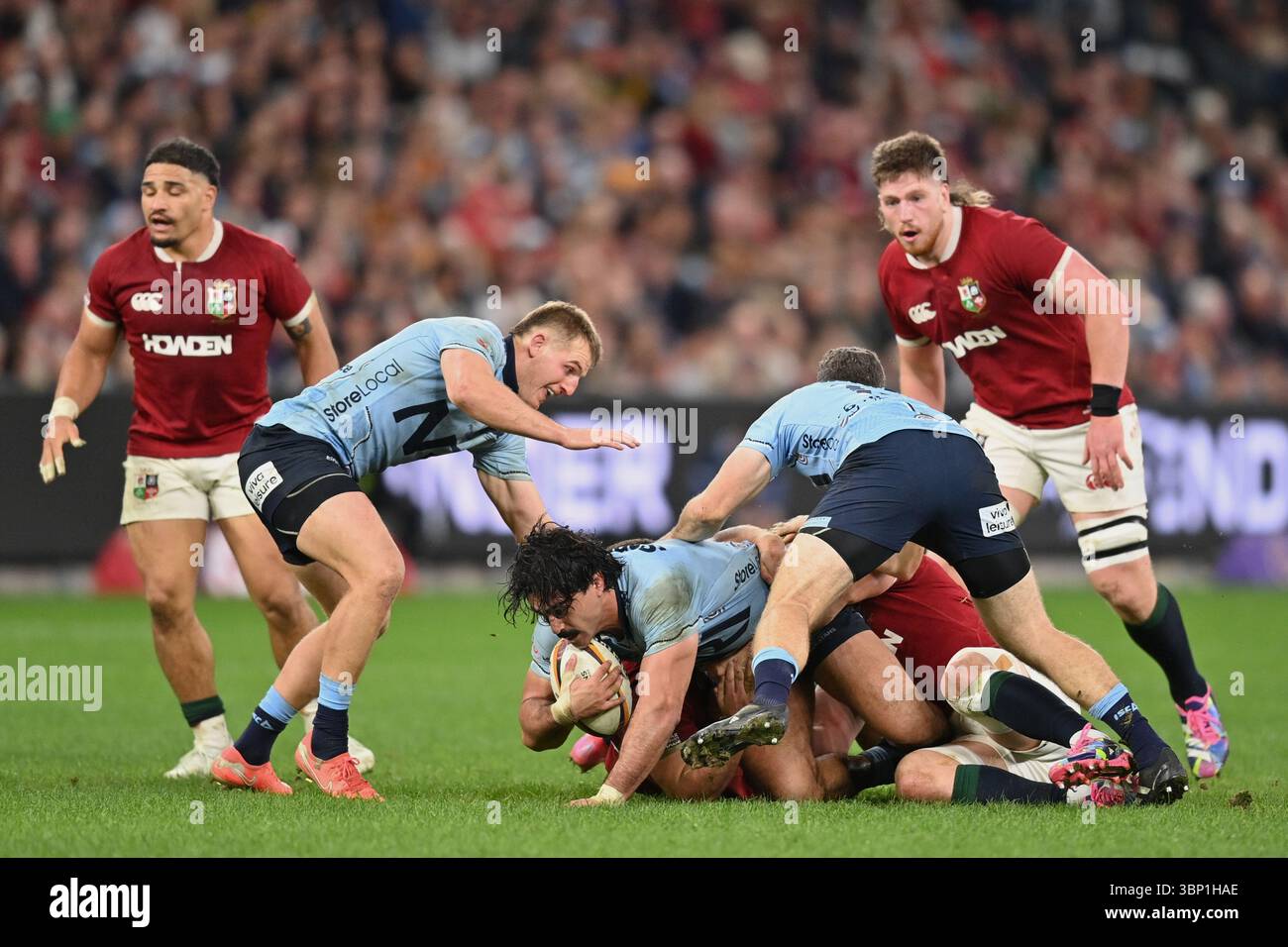 Charlie Gamble of the Waratahs is tackled during the tour match between ...