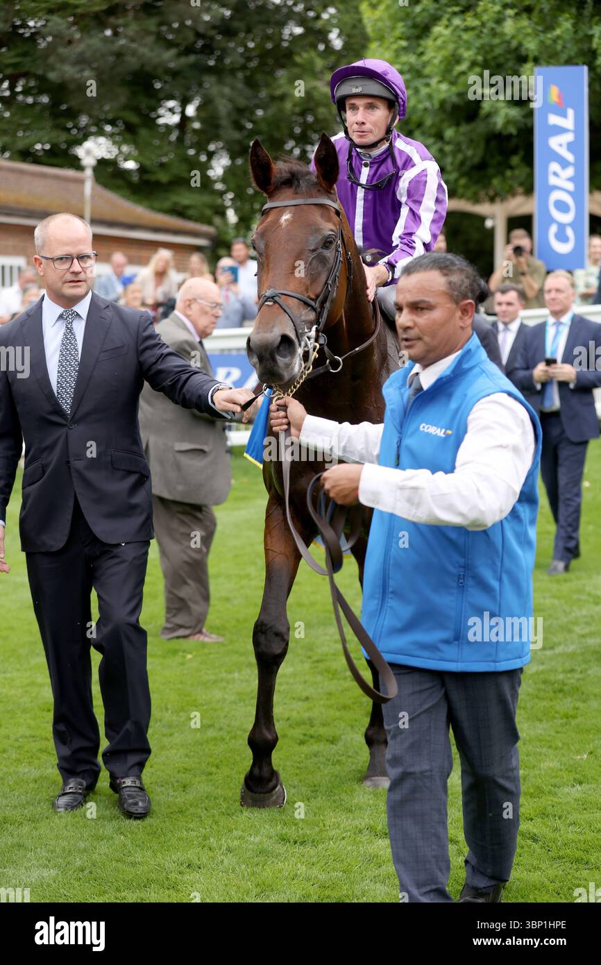 Jockey Ryan Moore and trainer Aidan O'Brien (left) after winning the ...