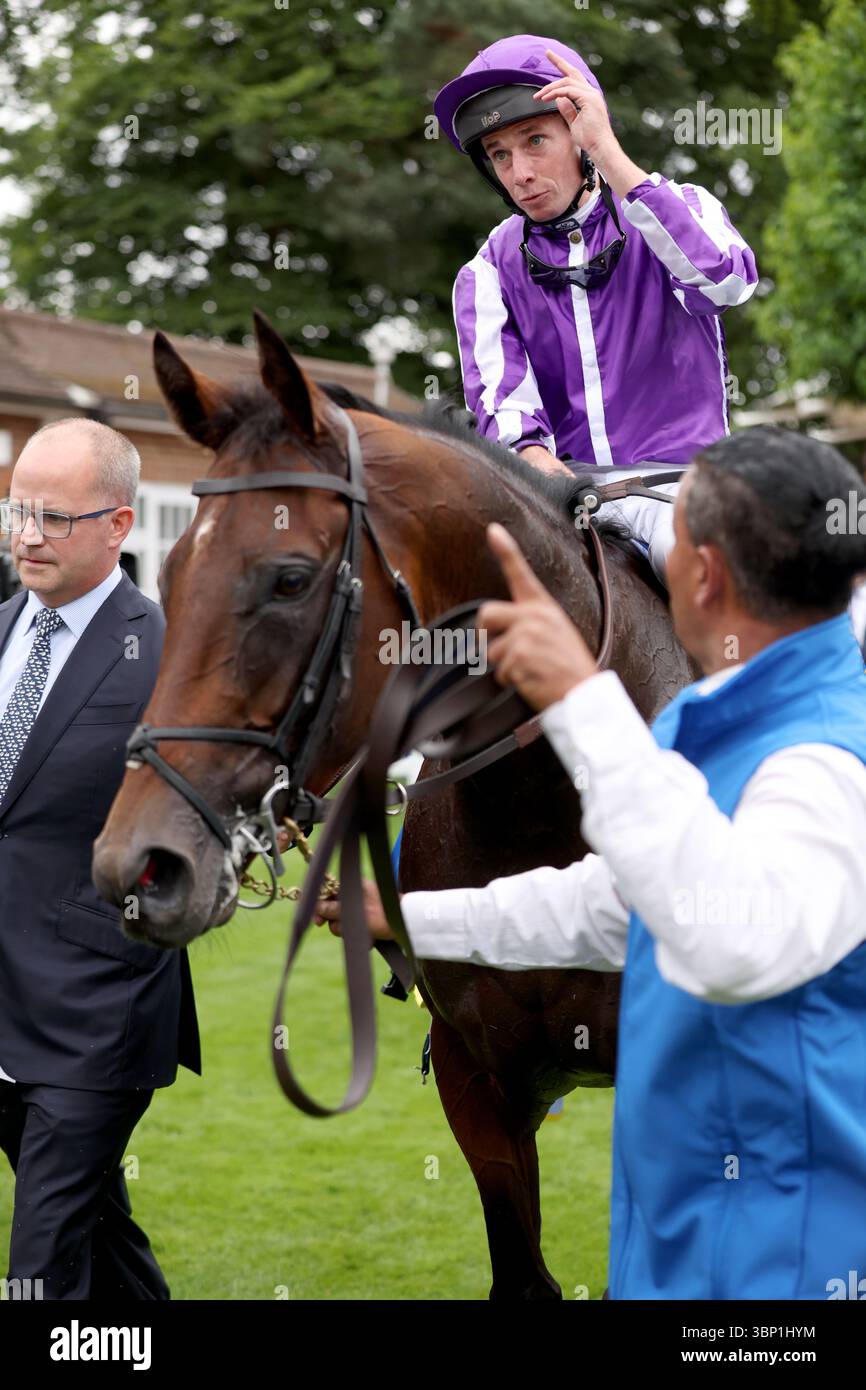 Jockey Ryan Moore and trainer Aidan O'Brien (left) after winning the ...