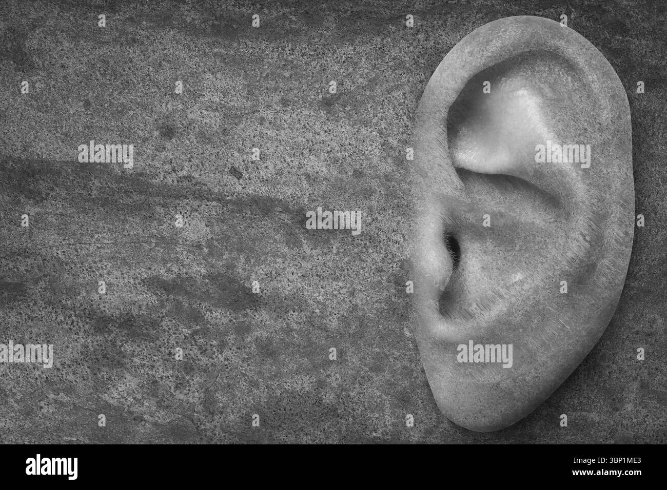 Human ear in grey stone wall, space for text. Eavesdropping, concept ...