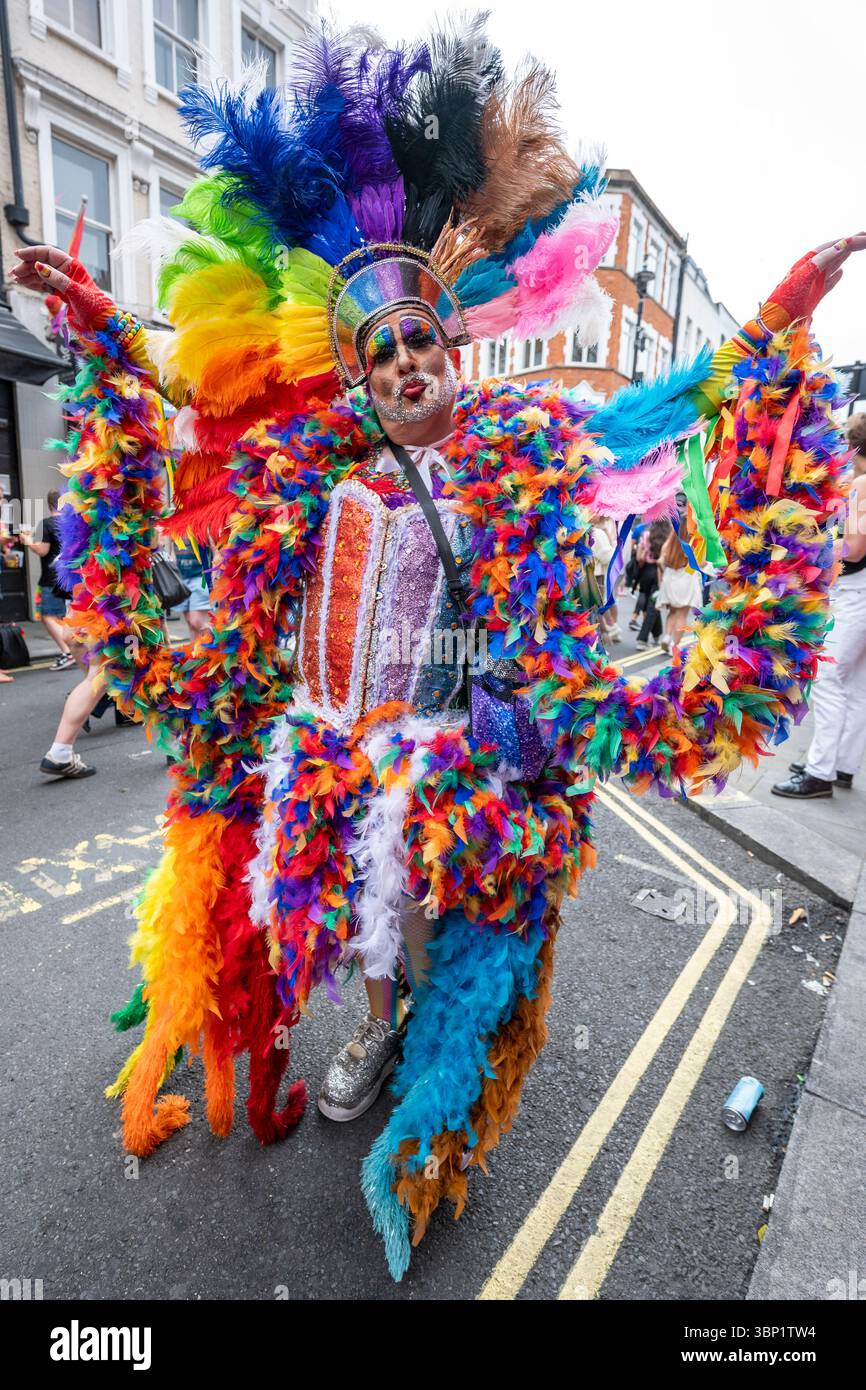 London, UK. 5 July 2025. A costumed reveller in Old Compton Street in ...