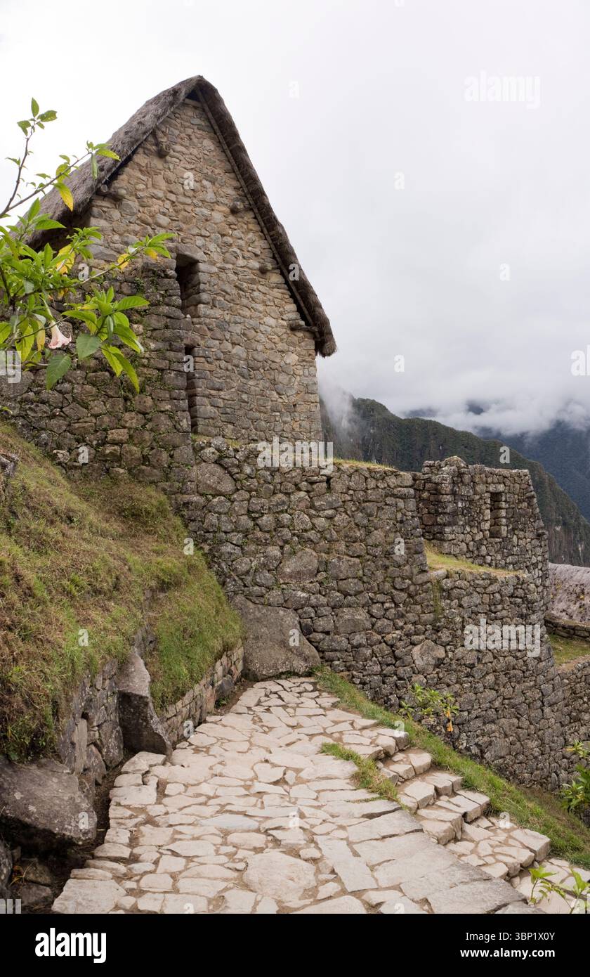 The guard house, or caretaker’s hut, is a restored stone building with ...