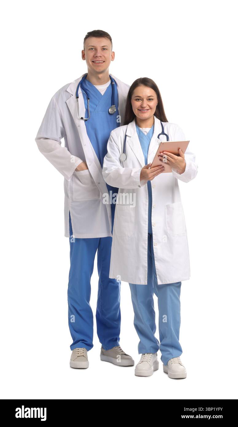 Medical students with tablet on white background Stock Photo - Alamy