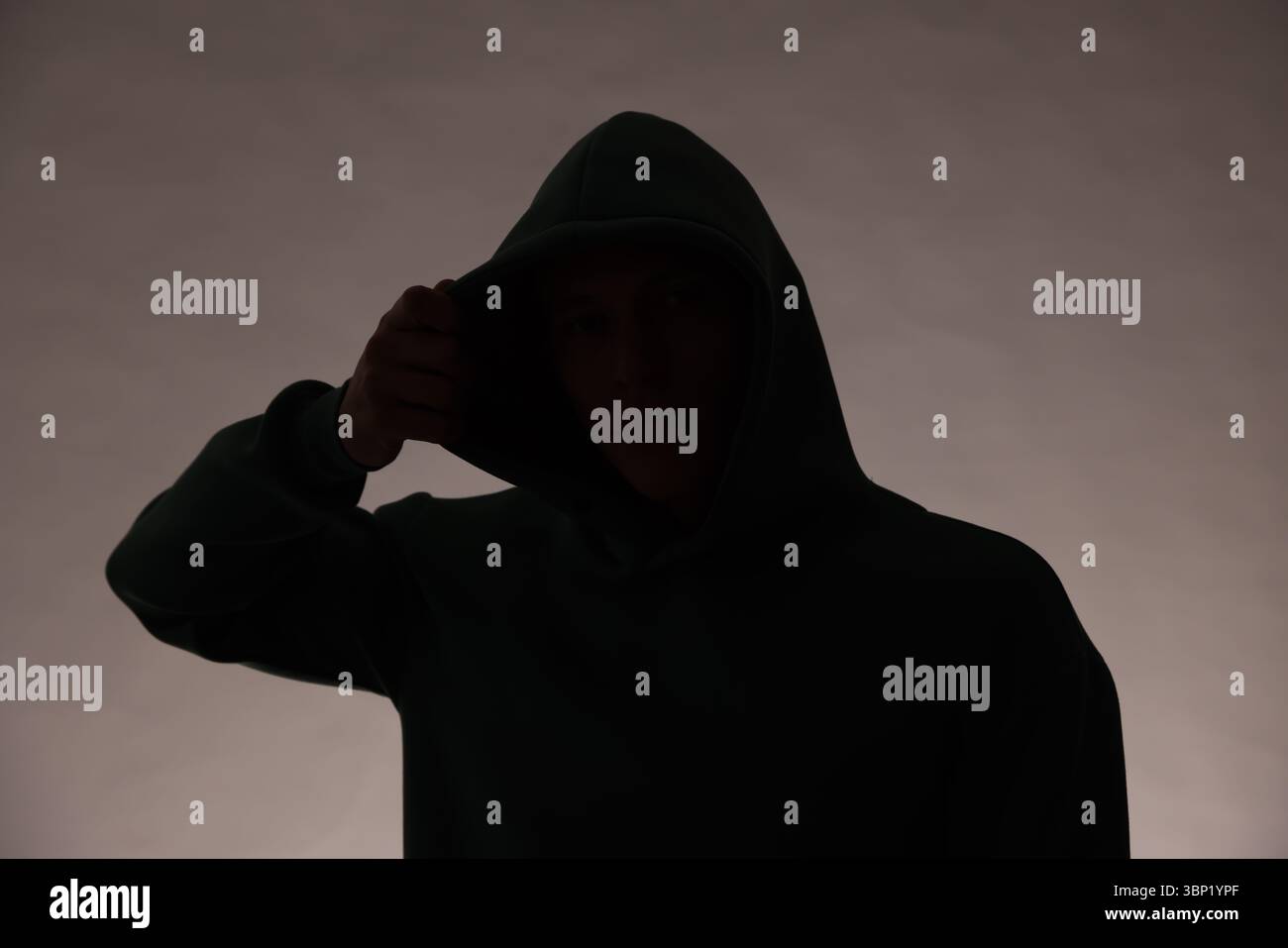 Silhouette hacker in hood hi-res stock photography and images - Alamy