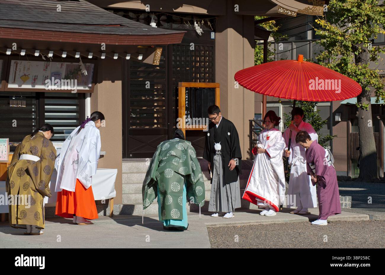 Shinto wedding ceremony procession priest, miko (maiden), bride and ...