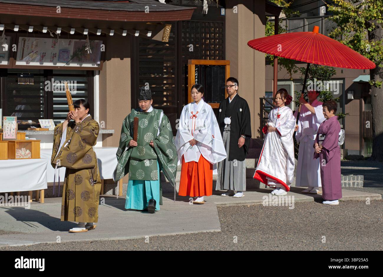 Shinto wedding ceremony procession priest, miko (maiden), bride and ...