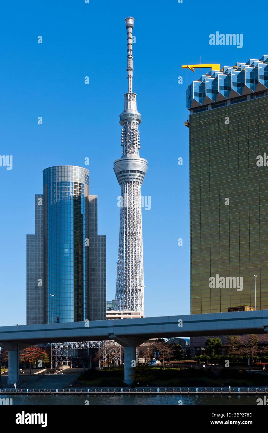 Tokyo Skytree, the radio and TV broadcasting tower, rising high above ...