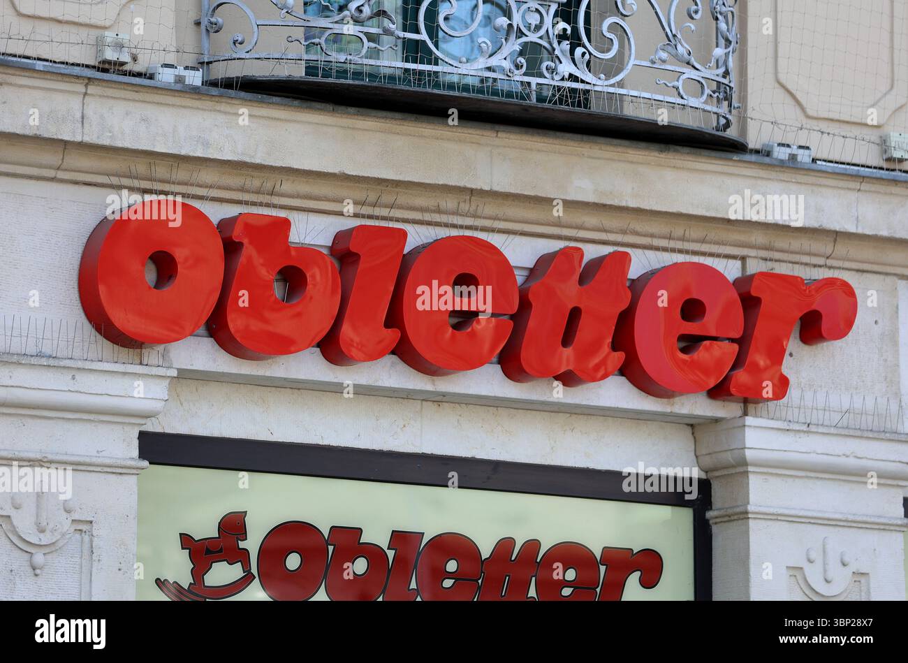 Hier im Bild das Logo der Firma Obletter in München, Spielwaren am ...