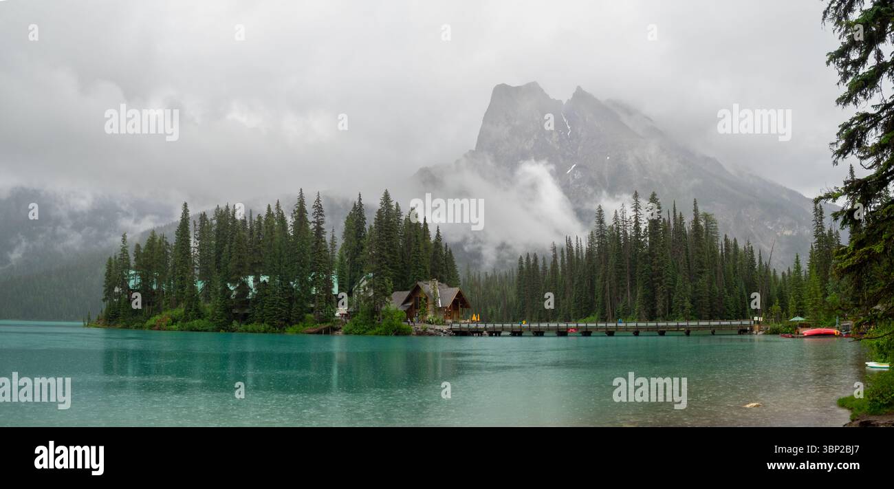 Emerald Lake island below the clouds and the mountain, Jasper NP ...