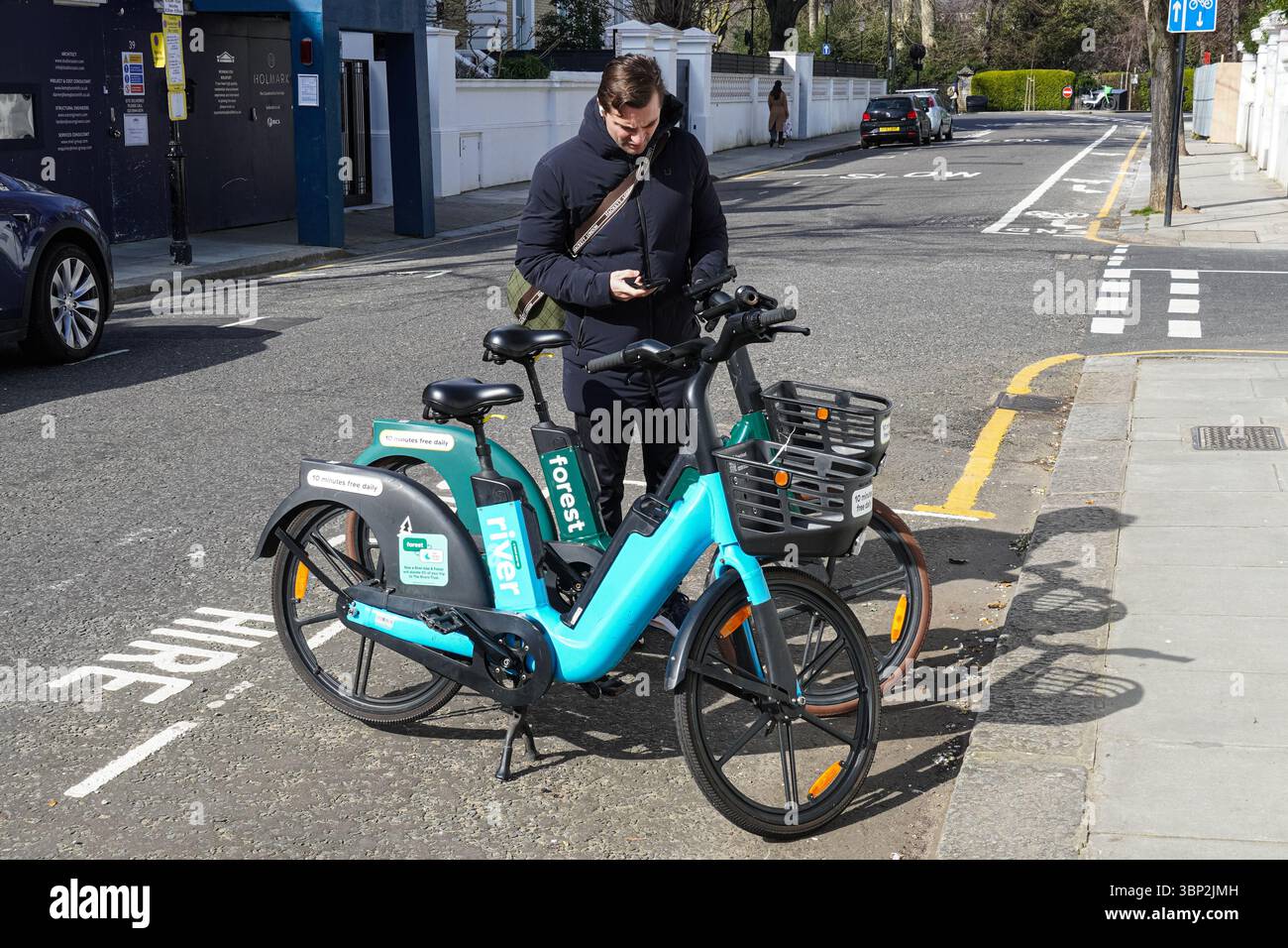 Forest and River electric bikes on a cycle hire parking space in London ...