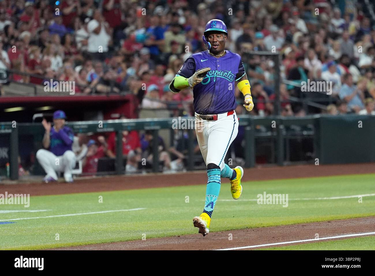Arizona Diamondbacks' Geraldo Perdomo scores a run against the Kansas ...