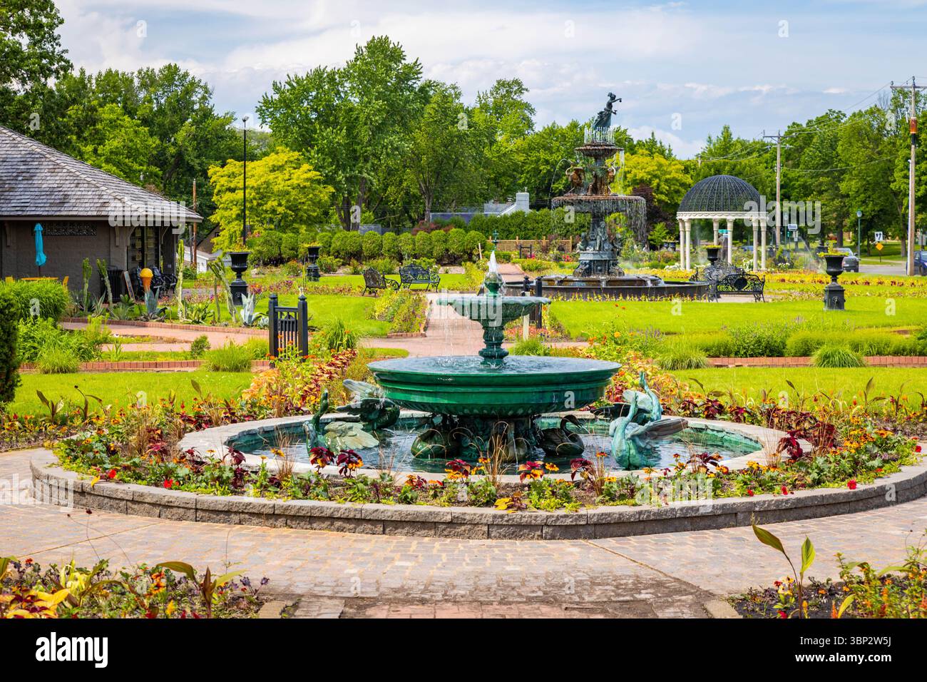 Magnificent Fountains of Munsinger Gardens in Summer around lush green ...