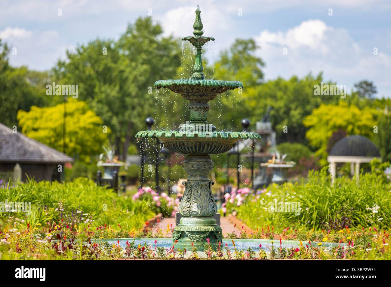 Magnificent Fountains of Munsinger Gardens in Summer around lush green ...