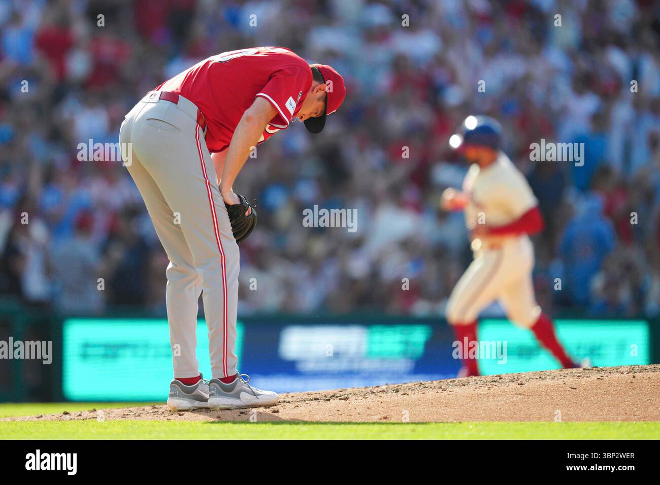 Cincinnati Reds pitcher Nick Lodolo reacts after giving up a two-run ...