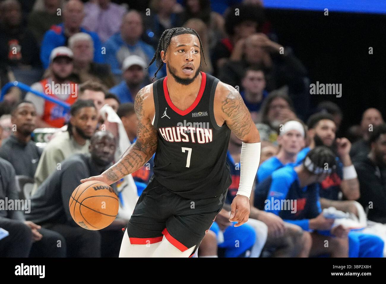 FILE - Houston Rockets forward Cam Whitmore pushes down the court ...