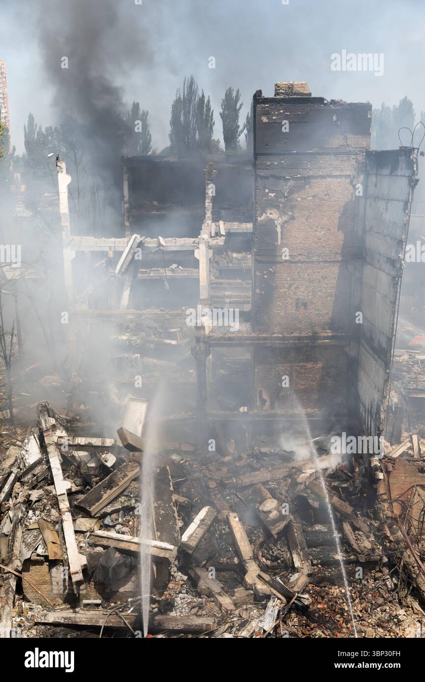 In Kyiv, destroyed and damaged buildings are seen following an air ...