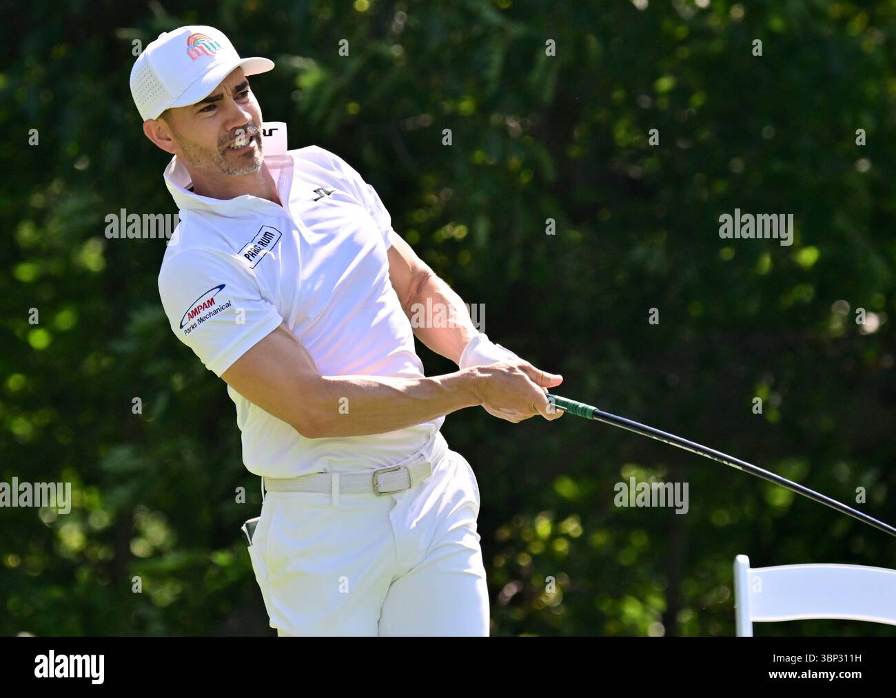 SILVIS, IL - JUL 05: Golfer Camilo Villegas watches his ball after ...