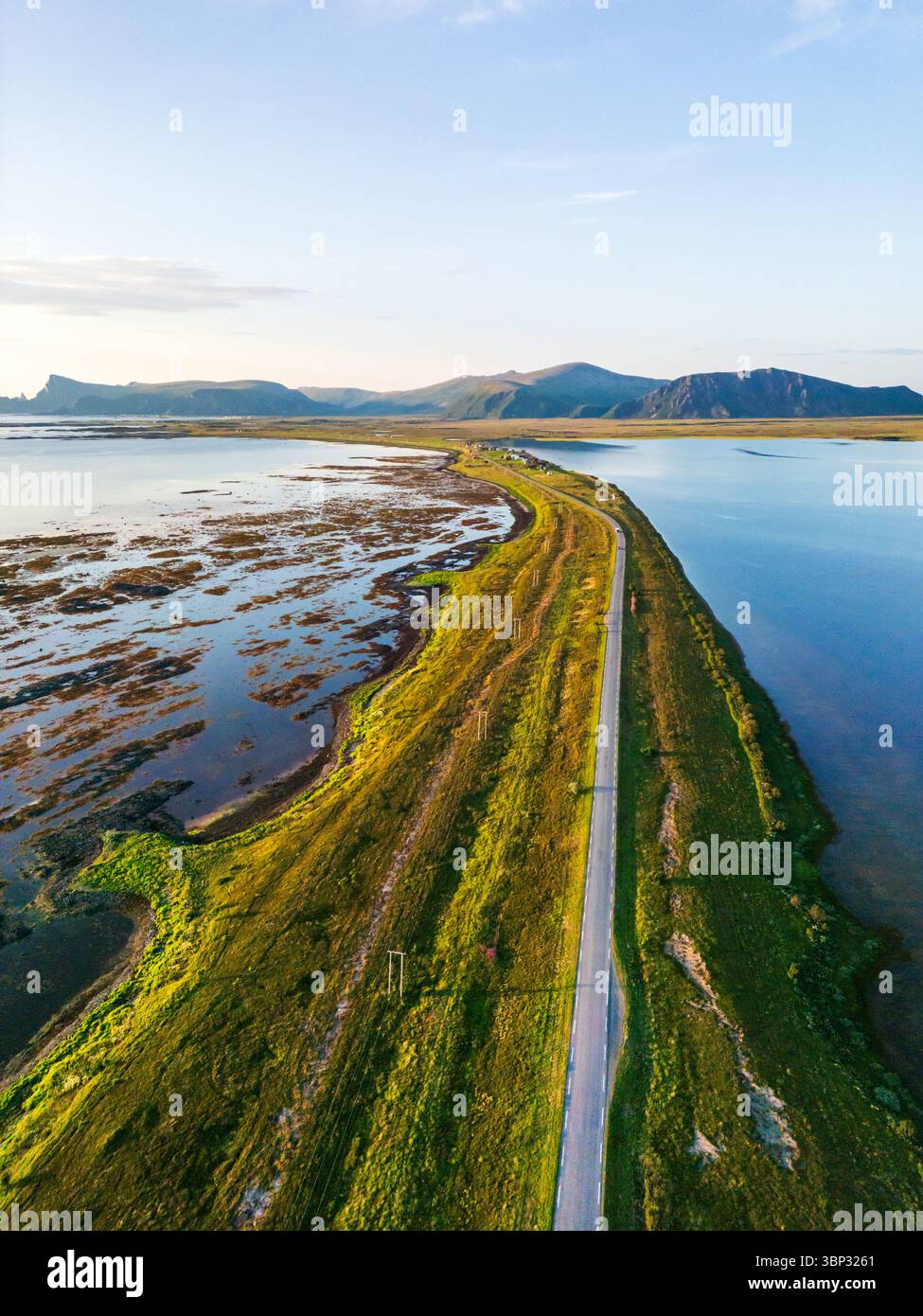 Andoya national tourist route in Norway with long straight road leading ...