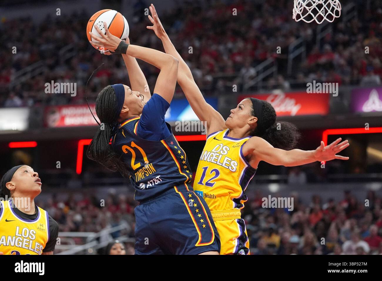 Indiana Fever's Makayla Timpson (21) shoots over Los Angeles Sparks ...