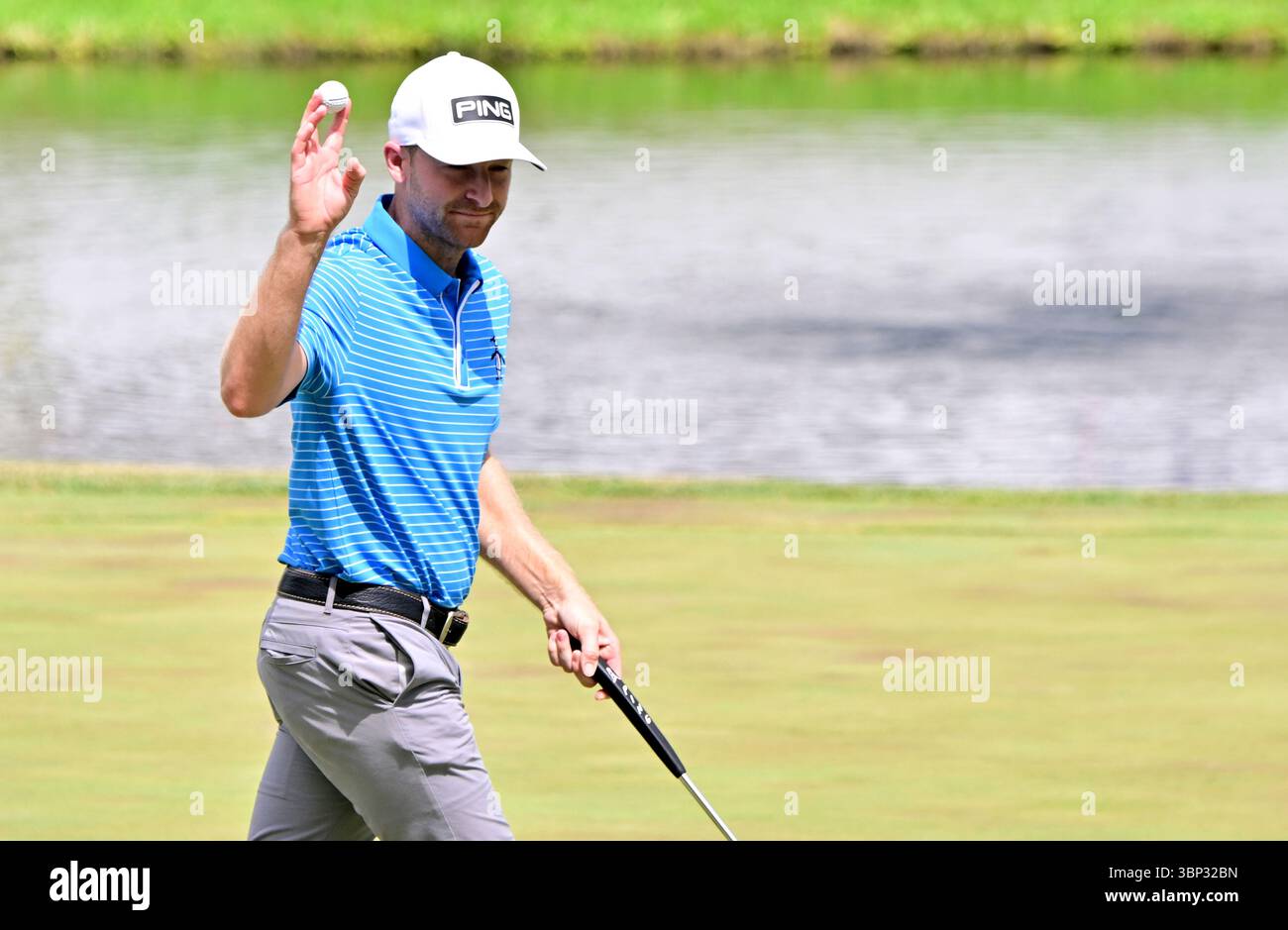 SILVIS, IL - JUL 05: Golfer Brian Campbell reacts after sinking a long ...