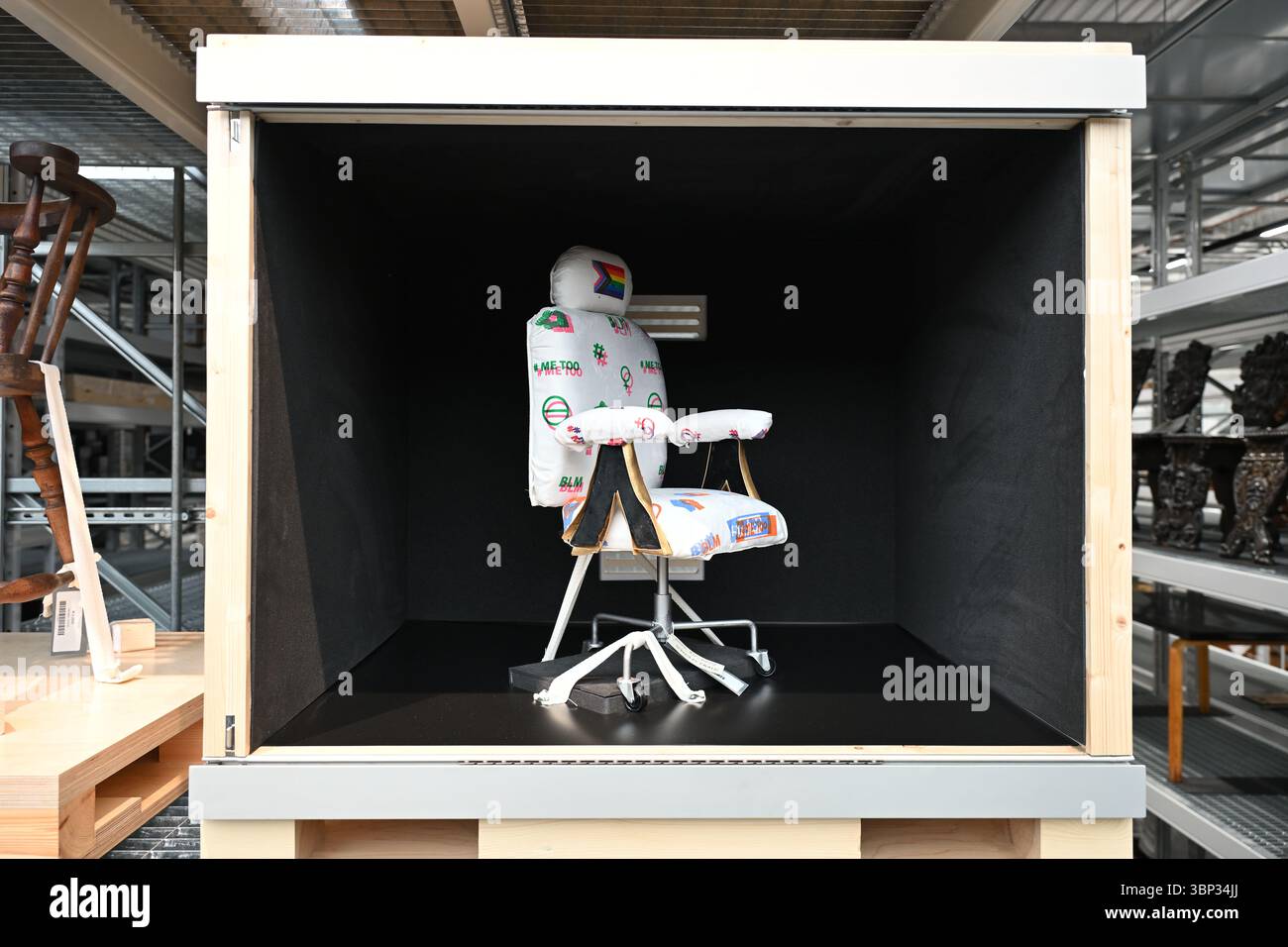 Office chair upholstered with various protest slogans - V&A East ...