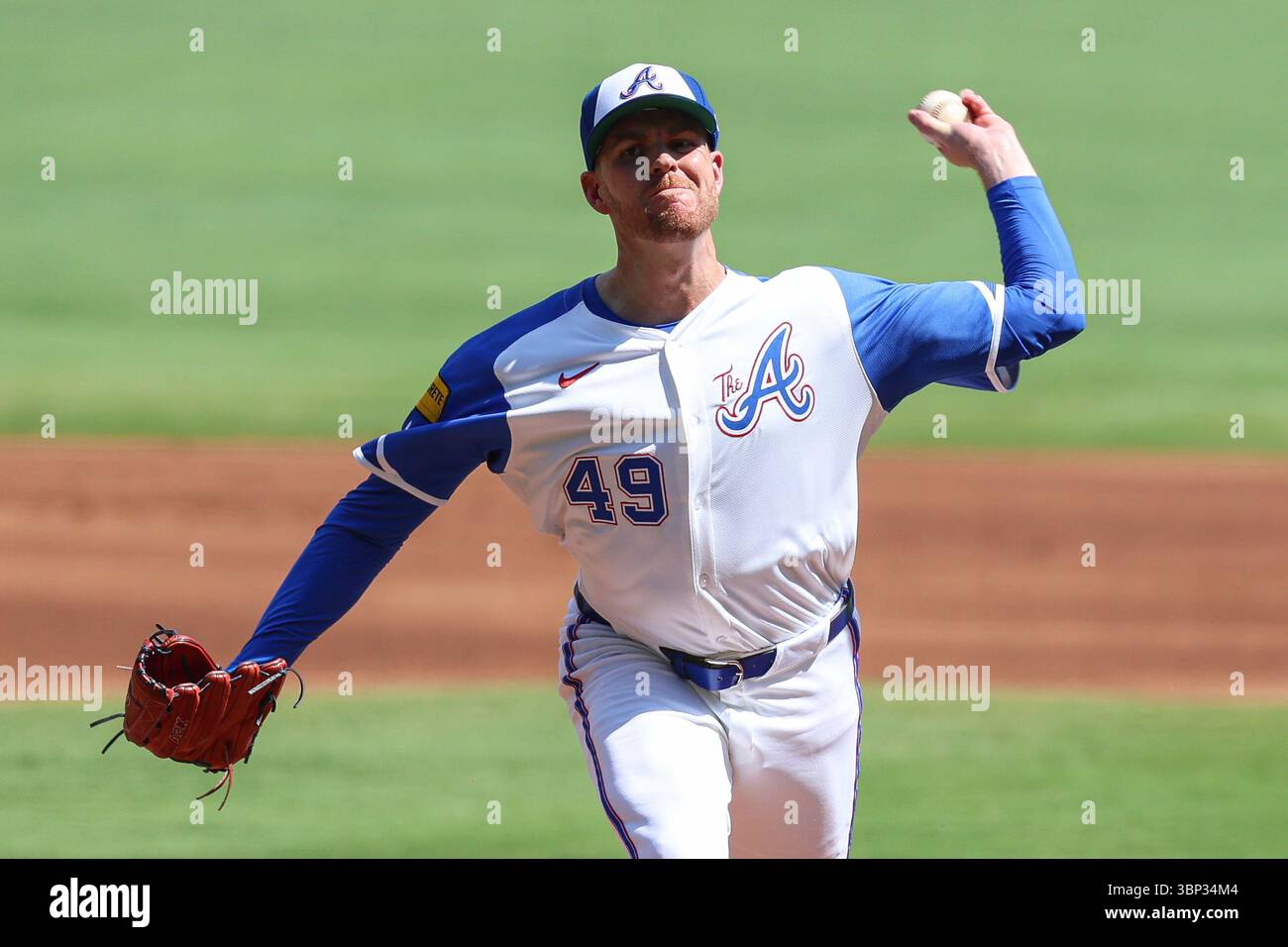Atlanta Braves pitcher Aaron Bummer (49) delivers in the first inning ...