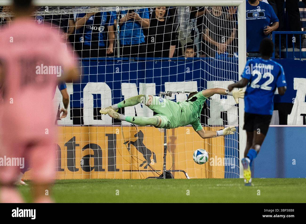 CF Montreal goalkeeper Jonathan Sirois, center, is scored against by ...