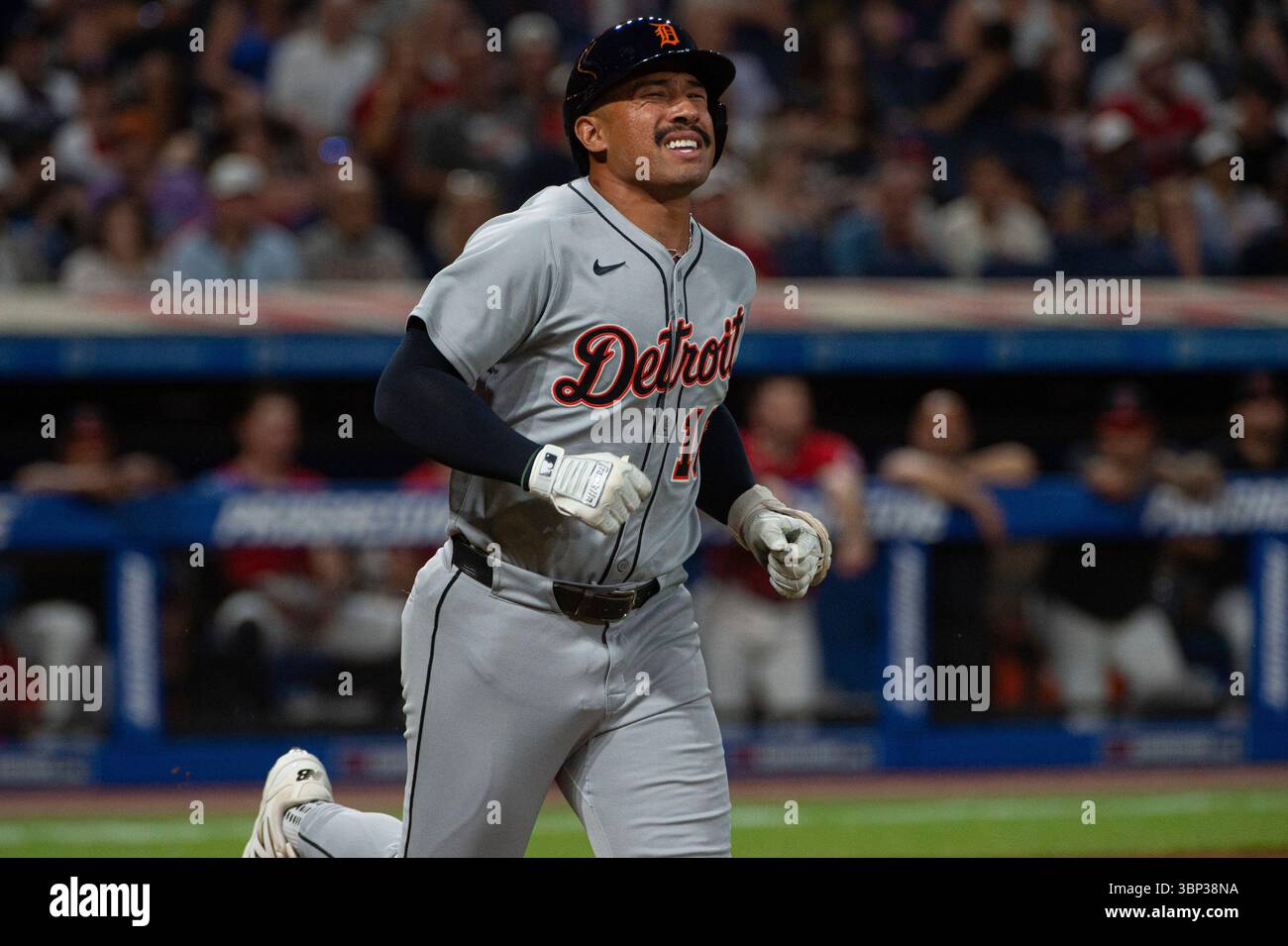 Detroit Tigers' Jahmai Jones reacts after being hit in the foot by a ...