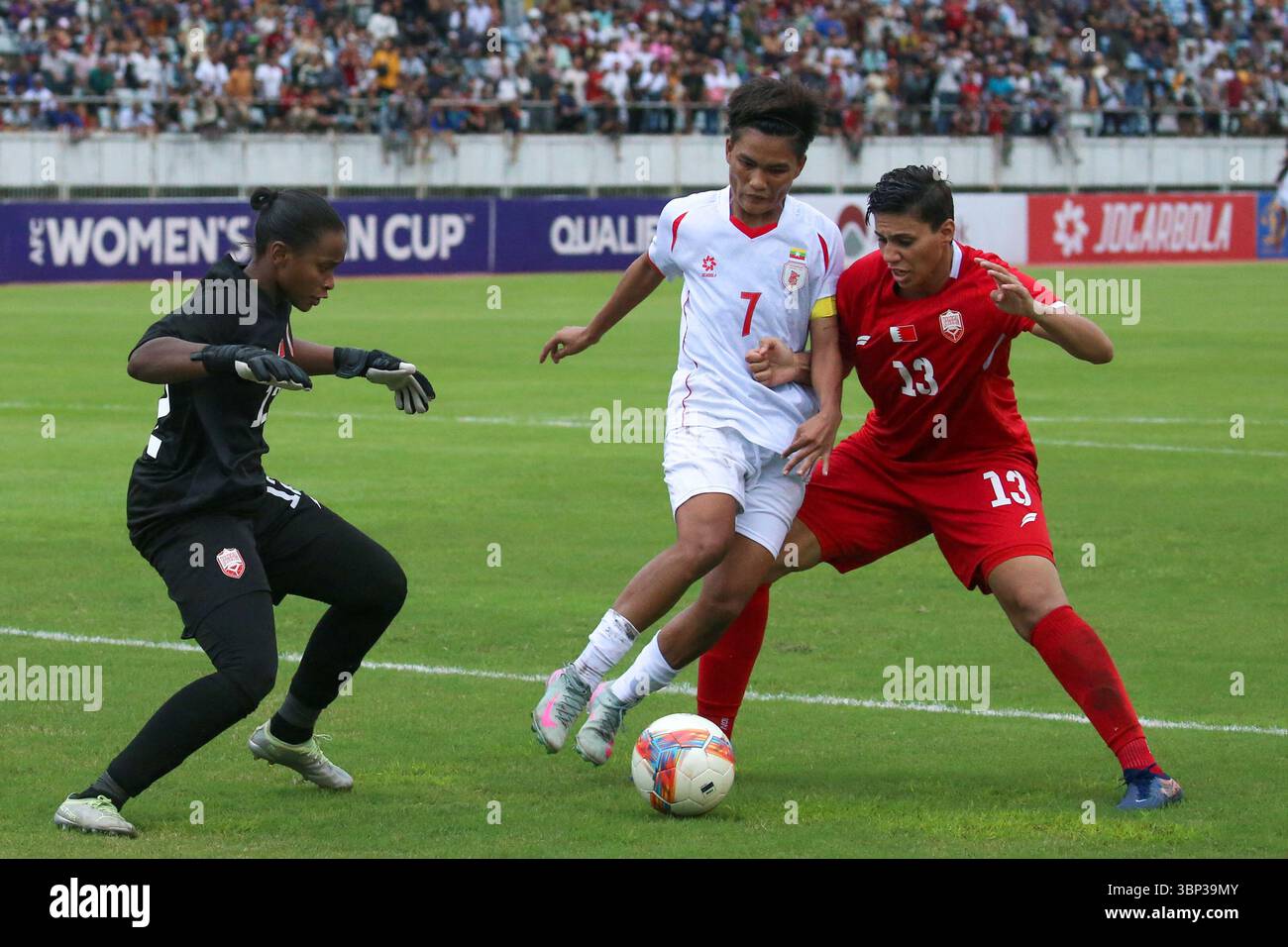 Yangon, Myanmar. 5th July, 2025. Win Theingi Tun (C) of Myanmar vies ...