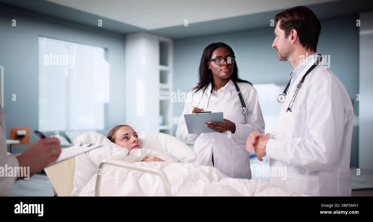 Healthcare Students Receiving Training In Hospital With Patient In Bed ...