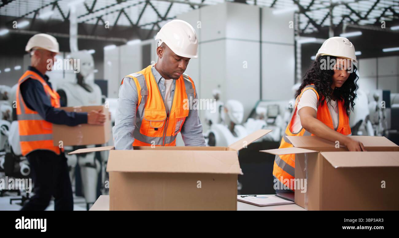 African American Engineer Supervises Diverse Team Of AI Robots Stock ...