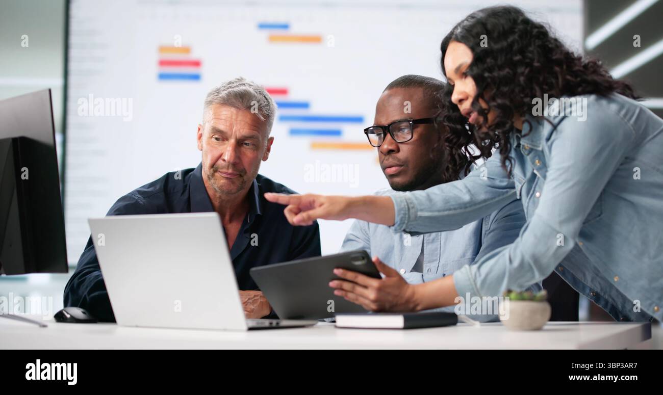 Diverse Corporate Team Using Gantt And Kanban Boards For Project Management. Man And Woman Work ...