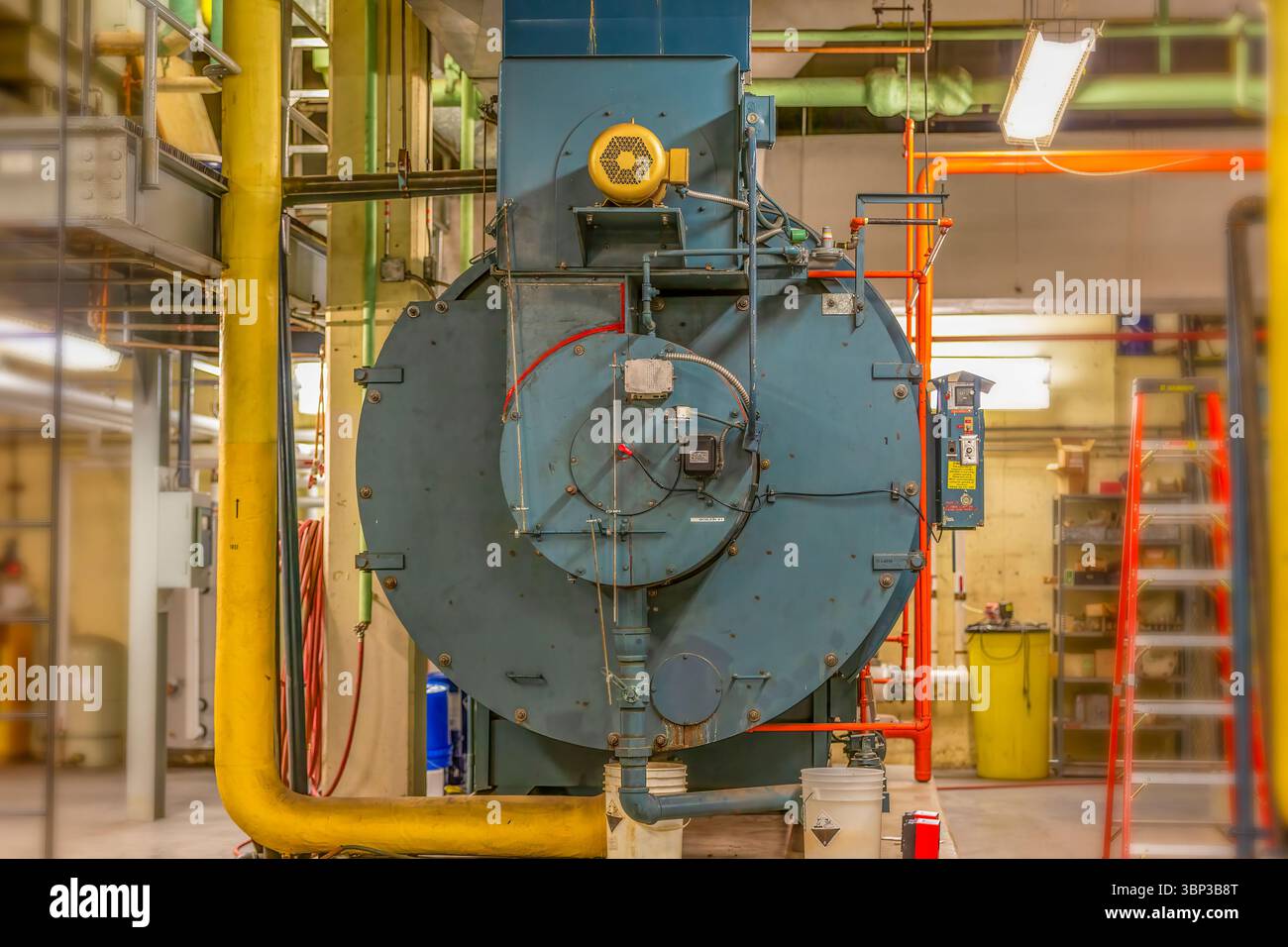 Old boiler in mechanical room Stock Photo - Alamy