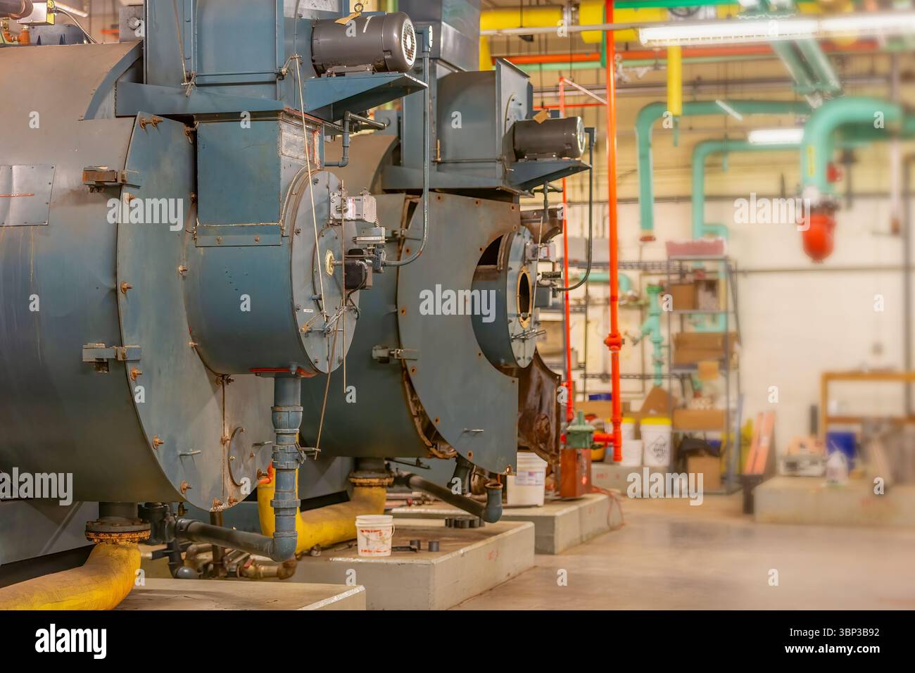 Old boilers in mechanical room of old building Stock Photo - Alamy