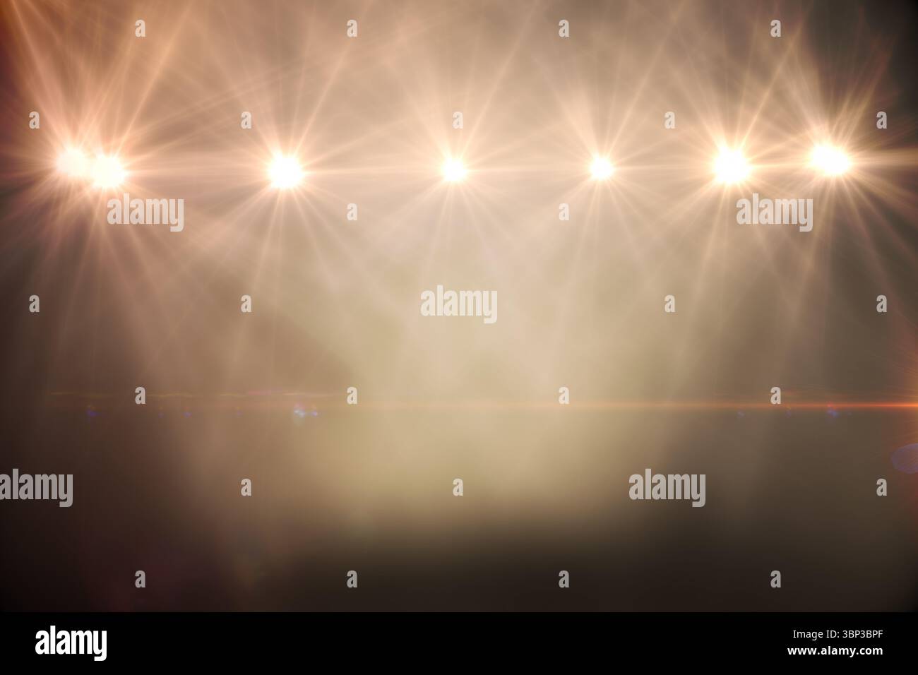 Six spotlights are shining through haze with lens flares and light ...