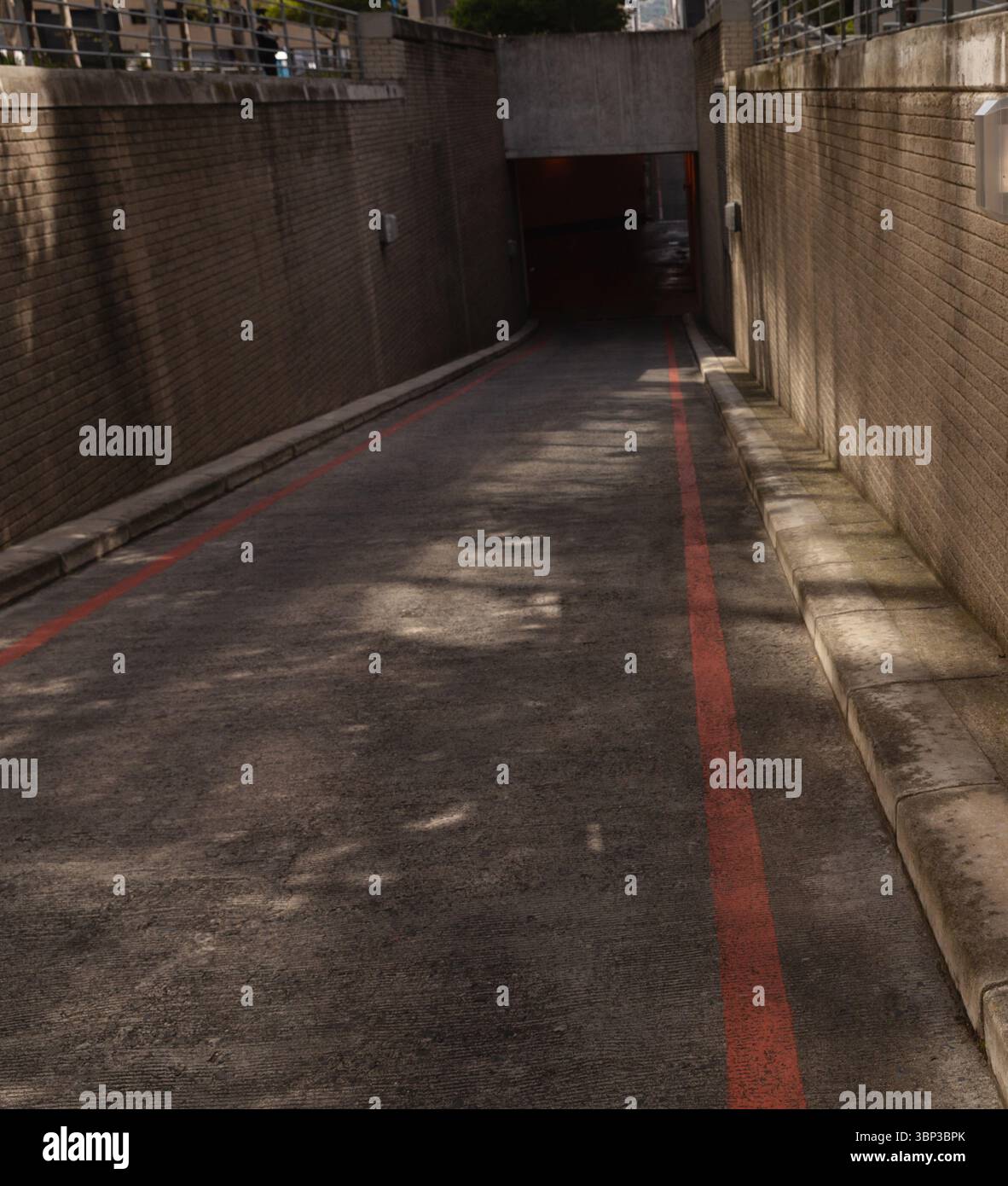 Sloping asphalt ramp is descending into underpass in flat design, with ...