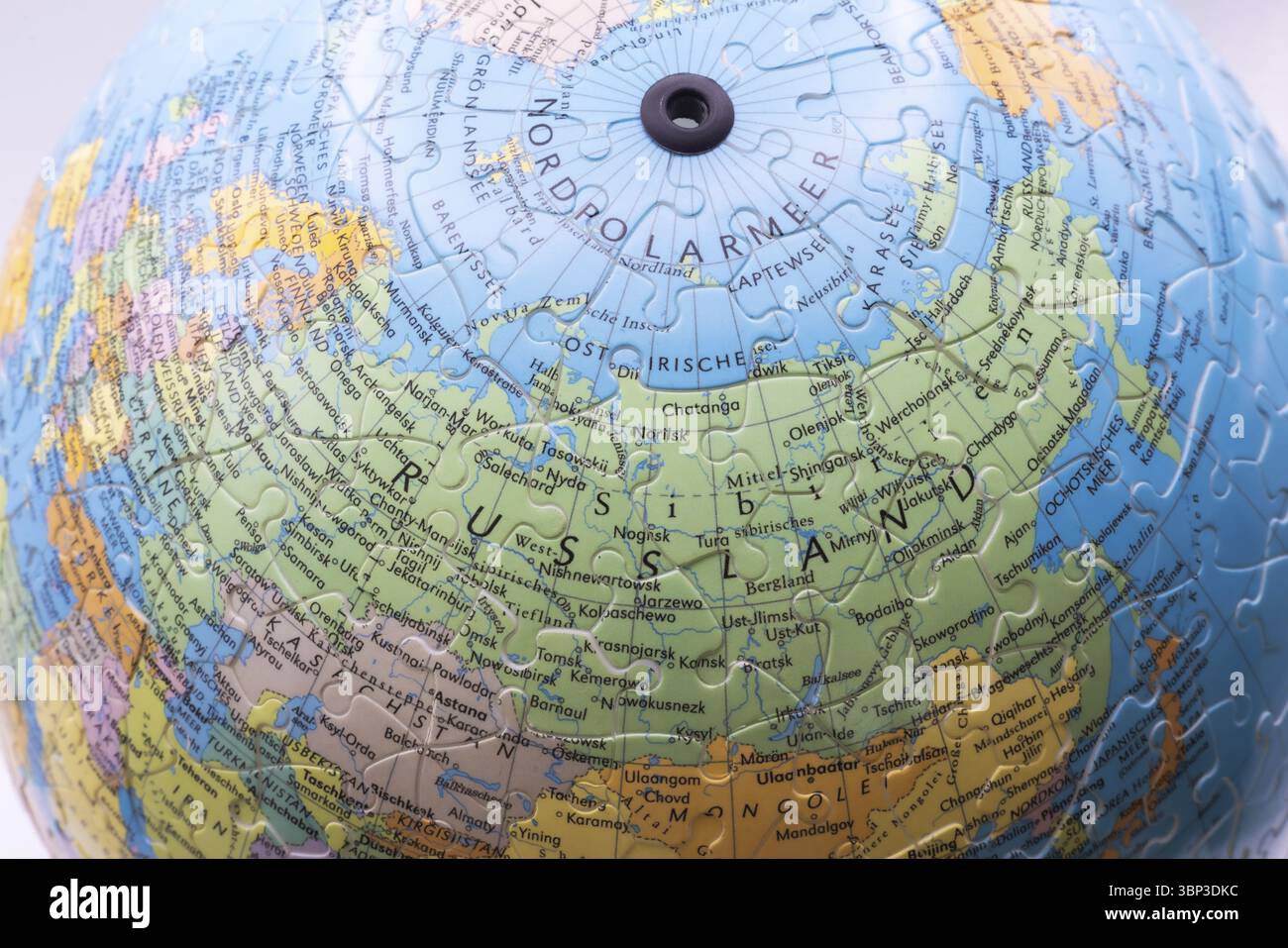 Puzzle globe. Map made from puzzle pieces. Russia Stock Photo - Alamy