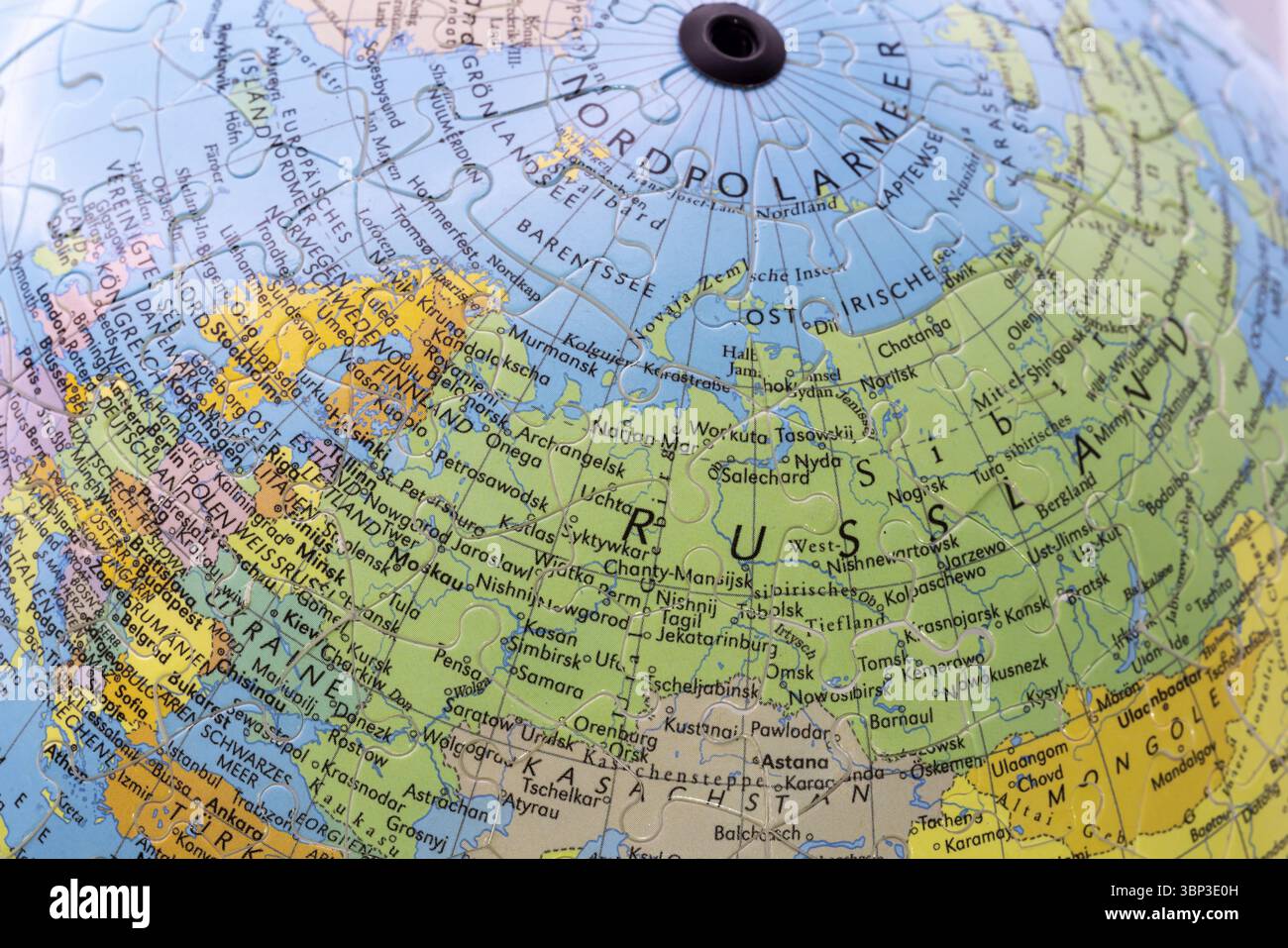 Puzzle globe. Map made from puzzle pieces. Russia and North Pole Stock ...