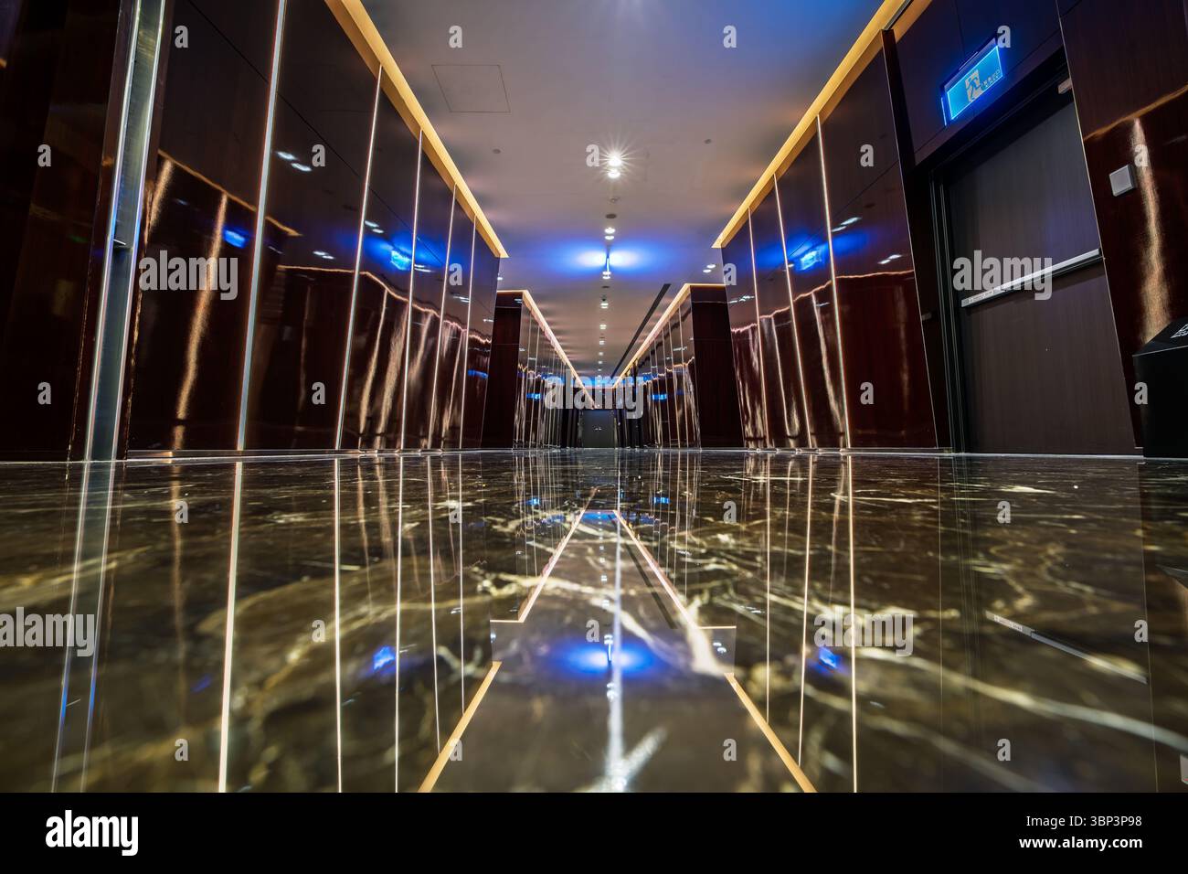 Reflection of light in a hallway Stock Photo - Alamy