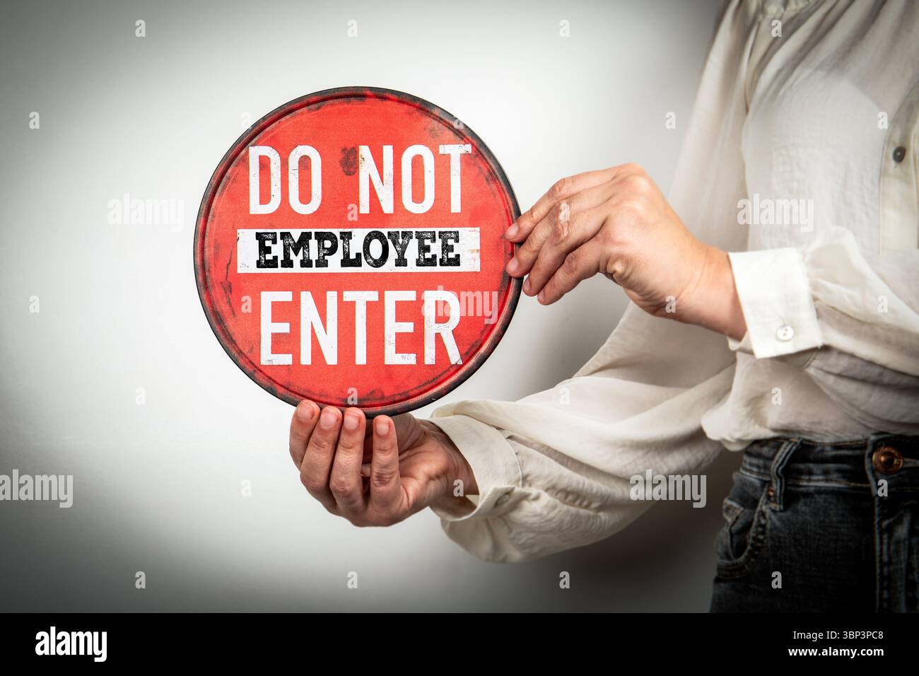 Employee Restriction Sign Held by Woman in Workplace or Office ...
