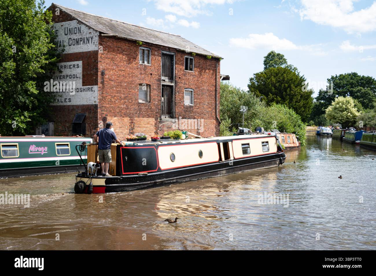 Canal barges on the Llangollen canal that crosses borders between ...
