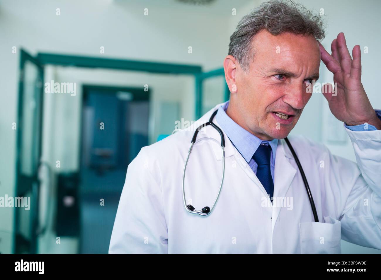 Hospital patient raising hand temple hi-res stock photography and ...