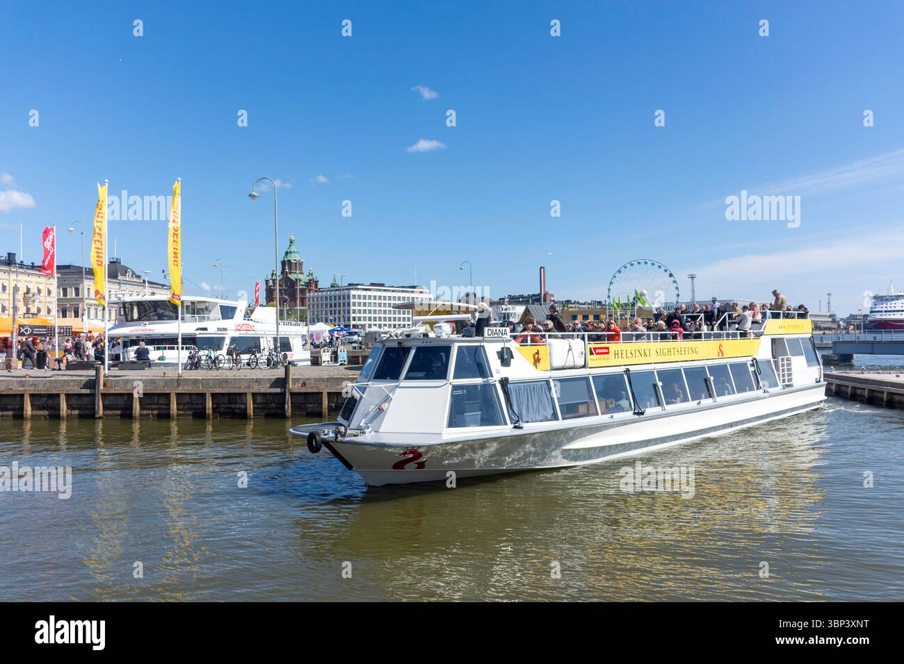 Helsinki Sightseeing Cruise boat at waterfront ferry terminal ...
