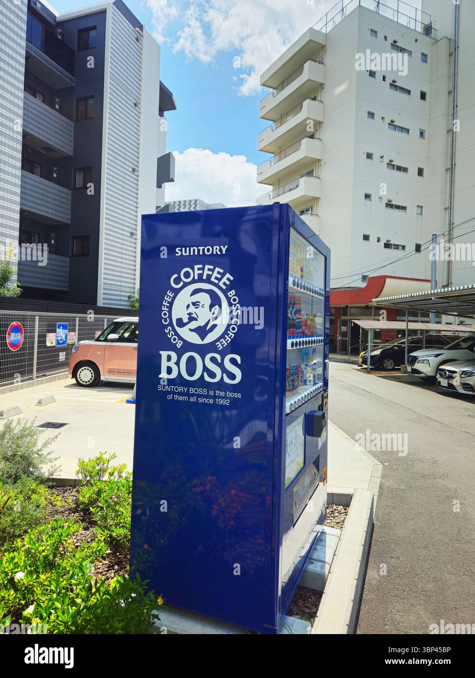Tokyo Japan Boss Coffee Vending Machine on Sunny Urban Street Stock ...