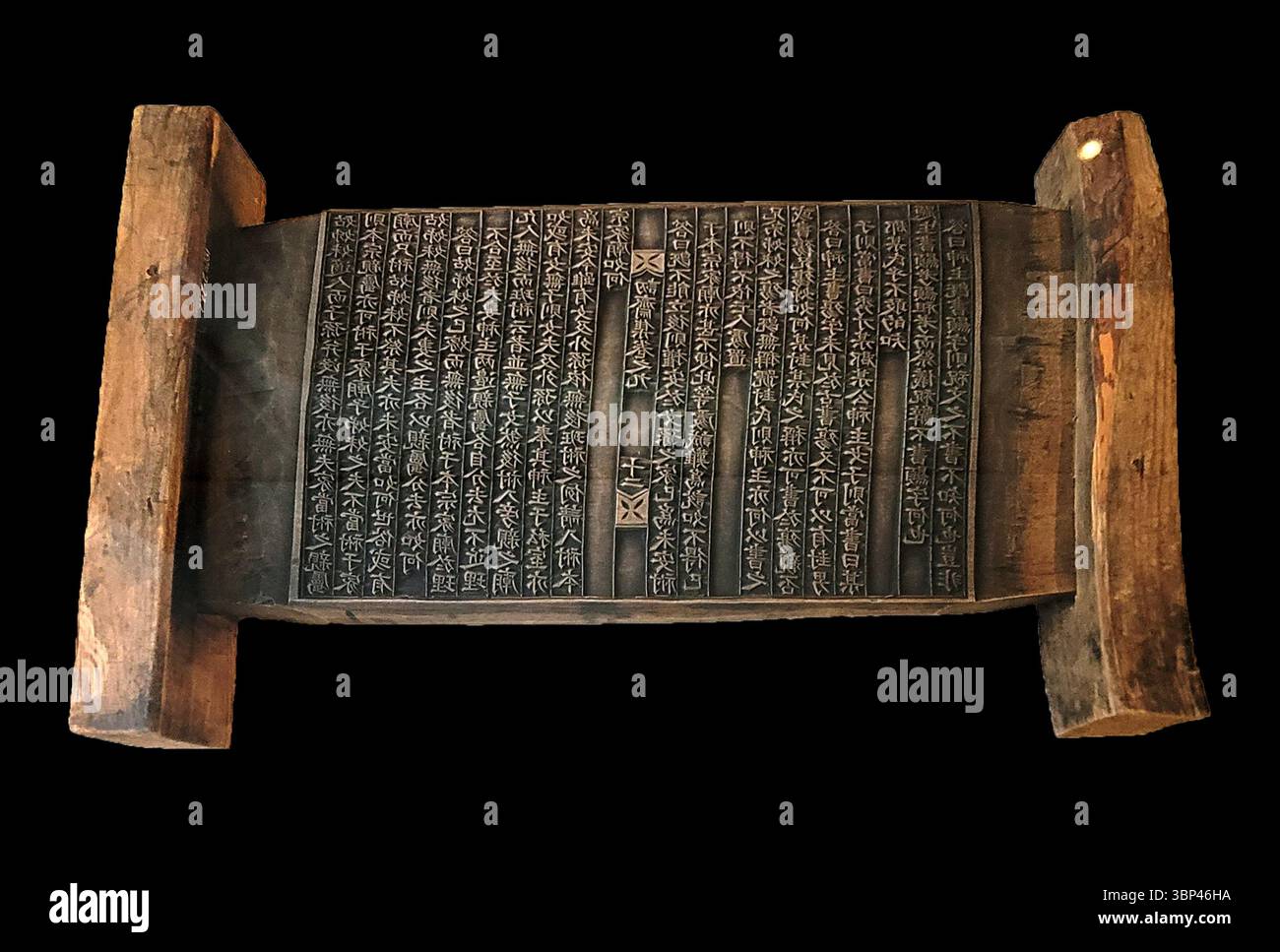 A Korean woodblock printing plate with Hangul metal typeface blocks ...