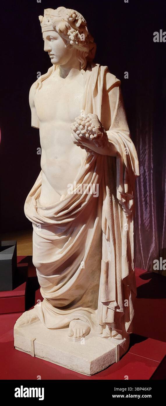A photograph of a Roman marble statue of Dionysus (Ancient Greek ...