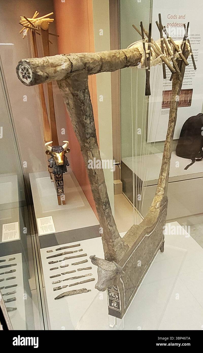 A photograph of the Silver Lyre from Ur, an ancient Mesopotamian ...