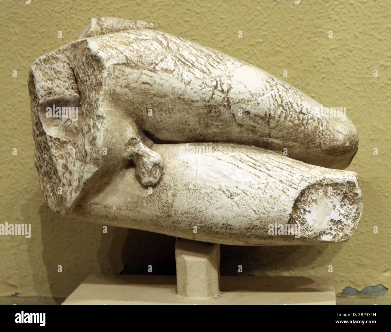 A photograph of a marble fragment from the Sanctuary of Asclepius in ...