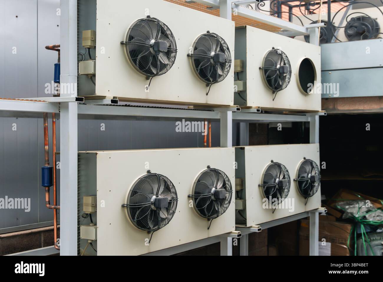 Chillers installed on vertical racks. Cooling system Stock Photo - Alamy